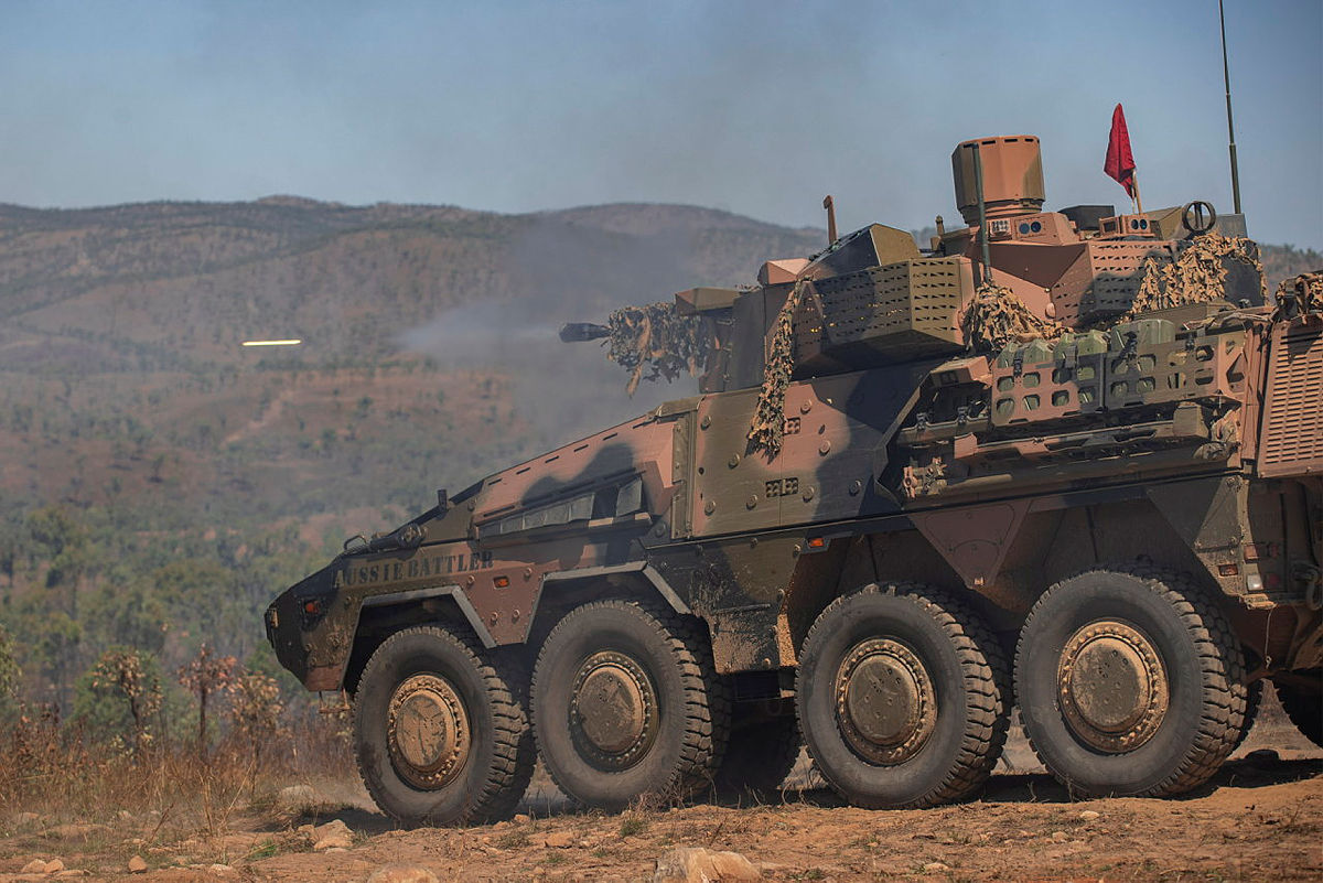 Boxers fire up in rugged bout - CONTACT magazine